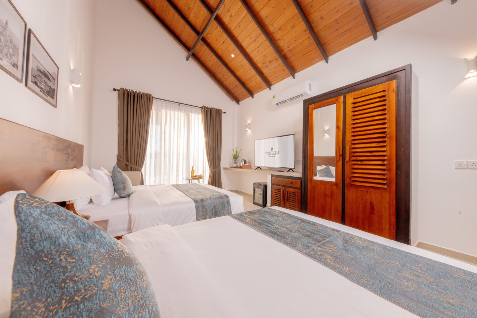 Rooms – Uppuveli Beach by DSK